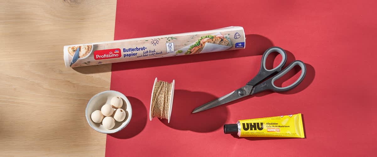 Engelanhänger aus Butterbrotpapier basteln | dm